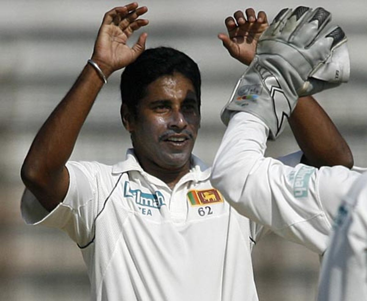 Chaminda Vaas gets the congratulations on picking up Tamim Iqbal's ...
