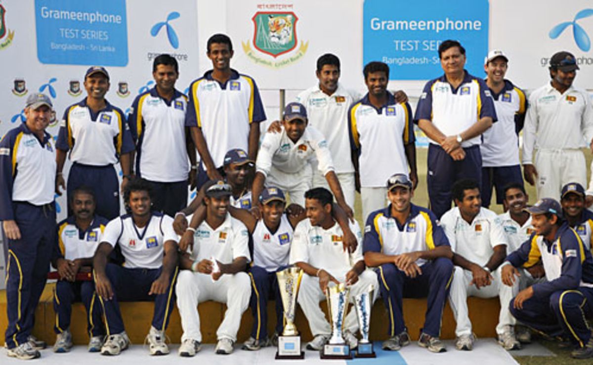 The Sri Lankan team poses for a photograph after winning the series ...