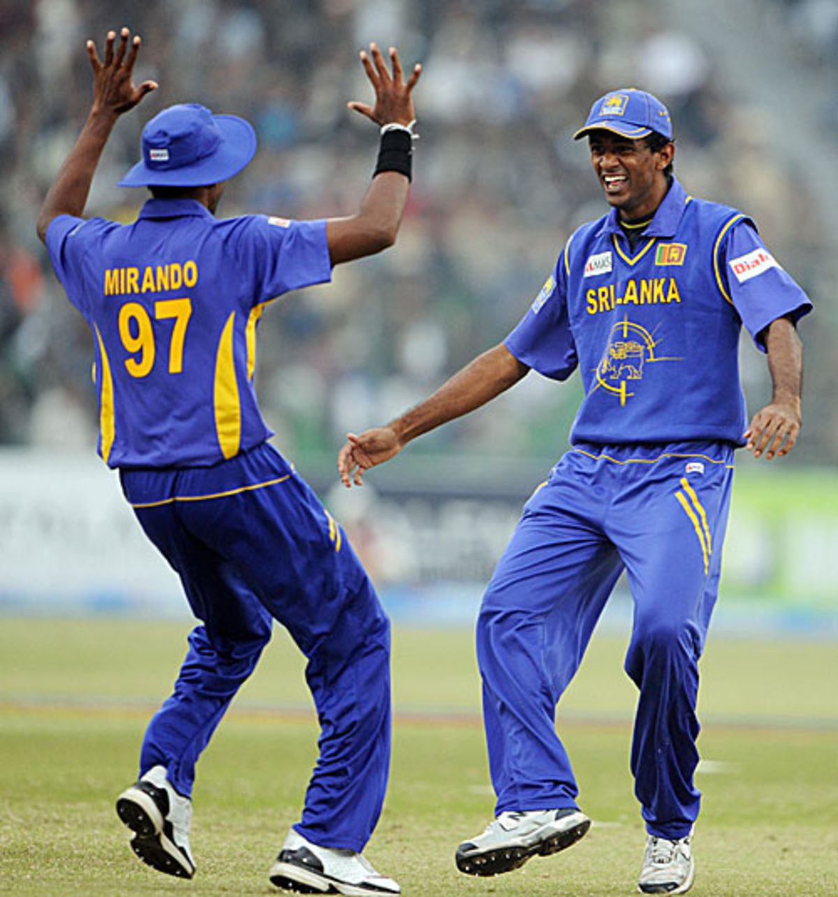 Farveez Maharoof celebrates with Thilan Thushara after pulling off a ...