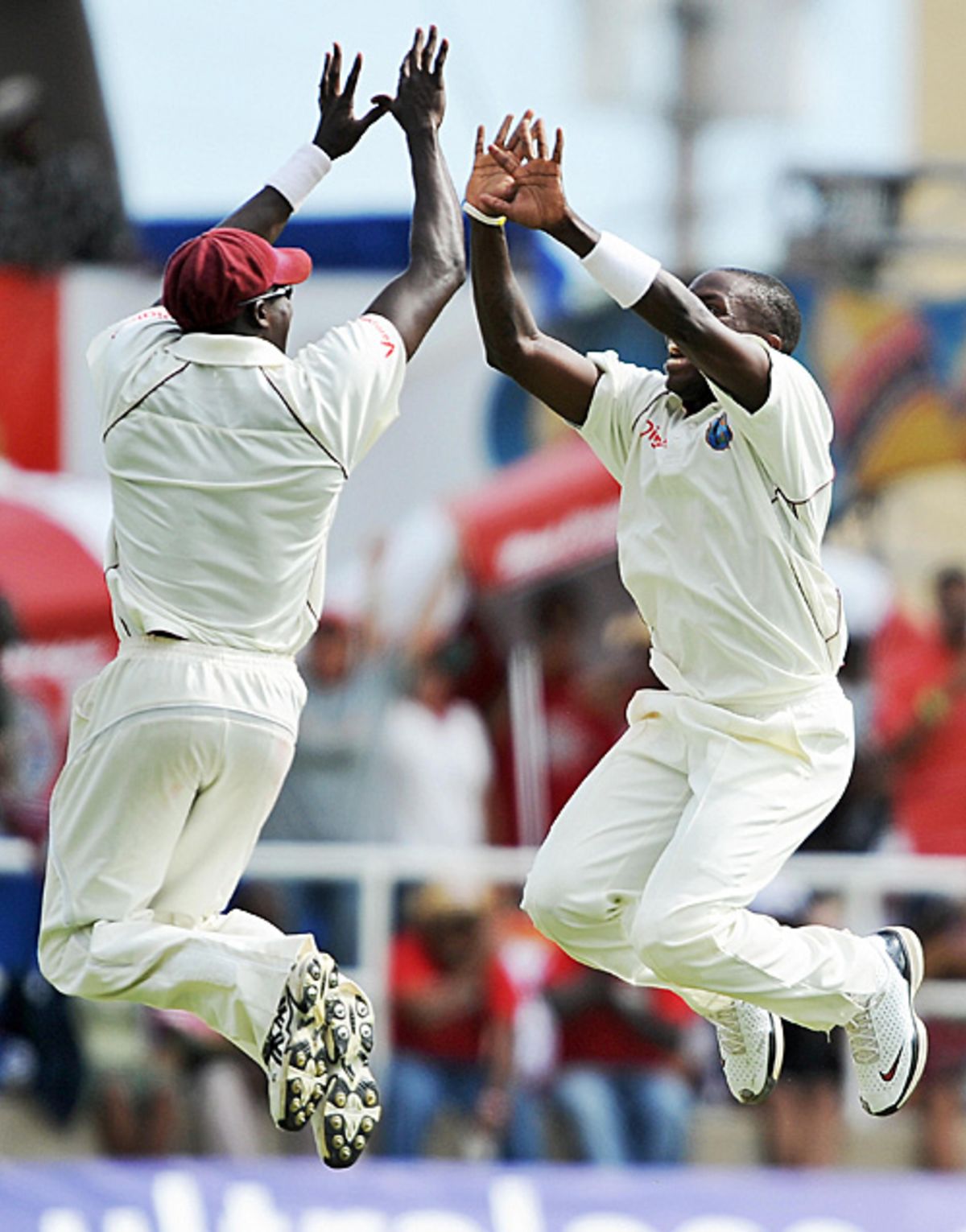 Jerome Taylor celebrates one of his five wickets against England ...