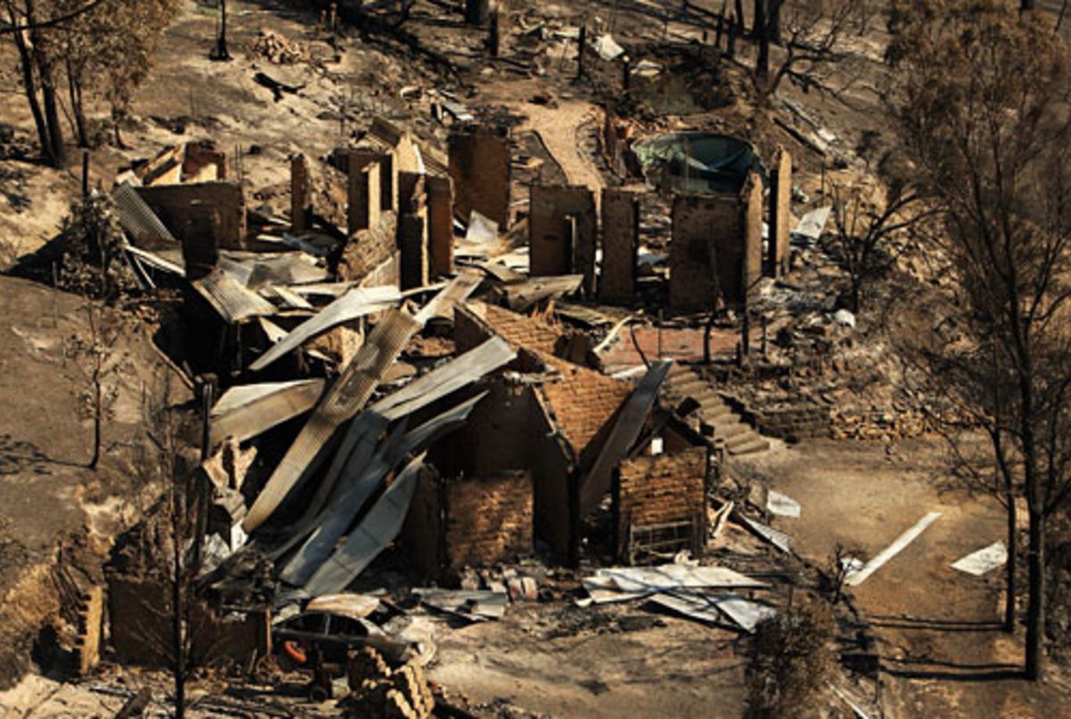 The remains of a house destroyed by bushfires | ESPNcricinfo.com