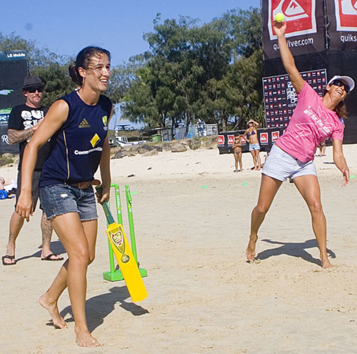 Sarah Andrews is at the non-striker's end as surfer Layne Beachley ...