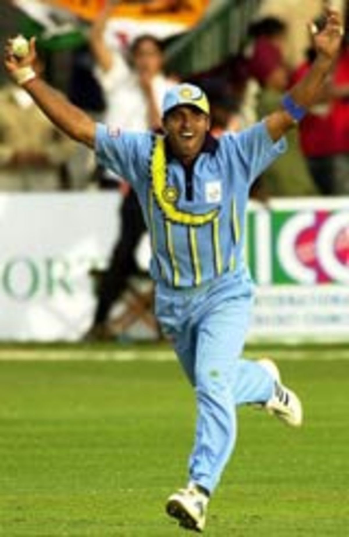 Robin Singh exults after taking a catch | ESPNcricinfo.com