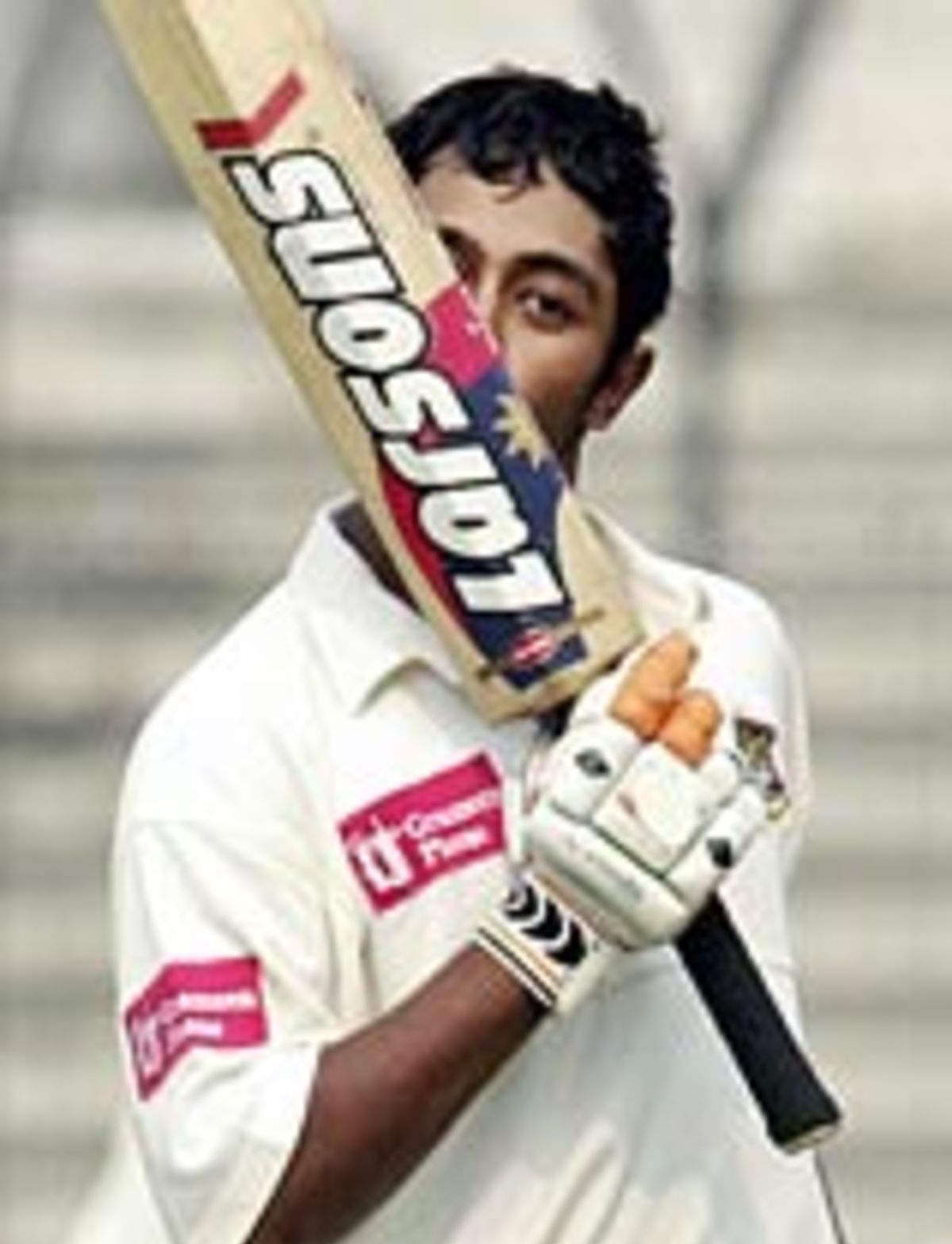 Nafis Iqbal kisses his bat | ESPNcricinfo.com