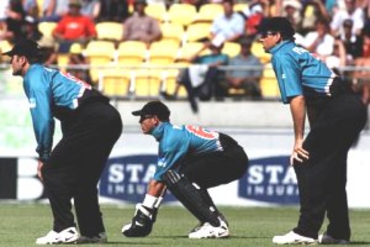 Mark Waugh hits out as Adam Parore and Chris Harris look on, New ...