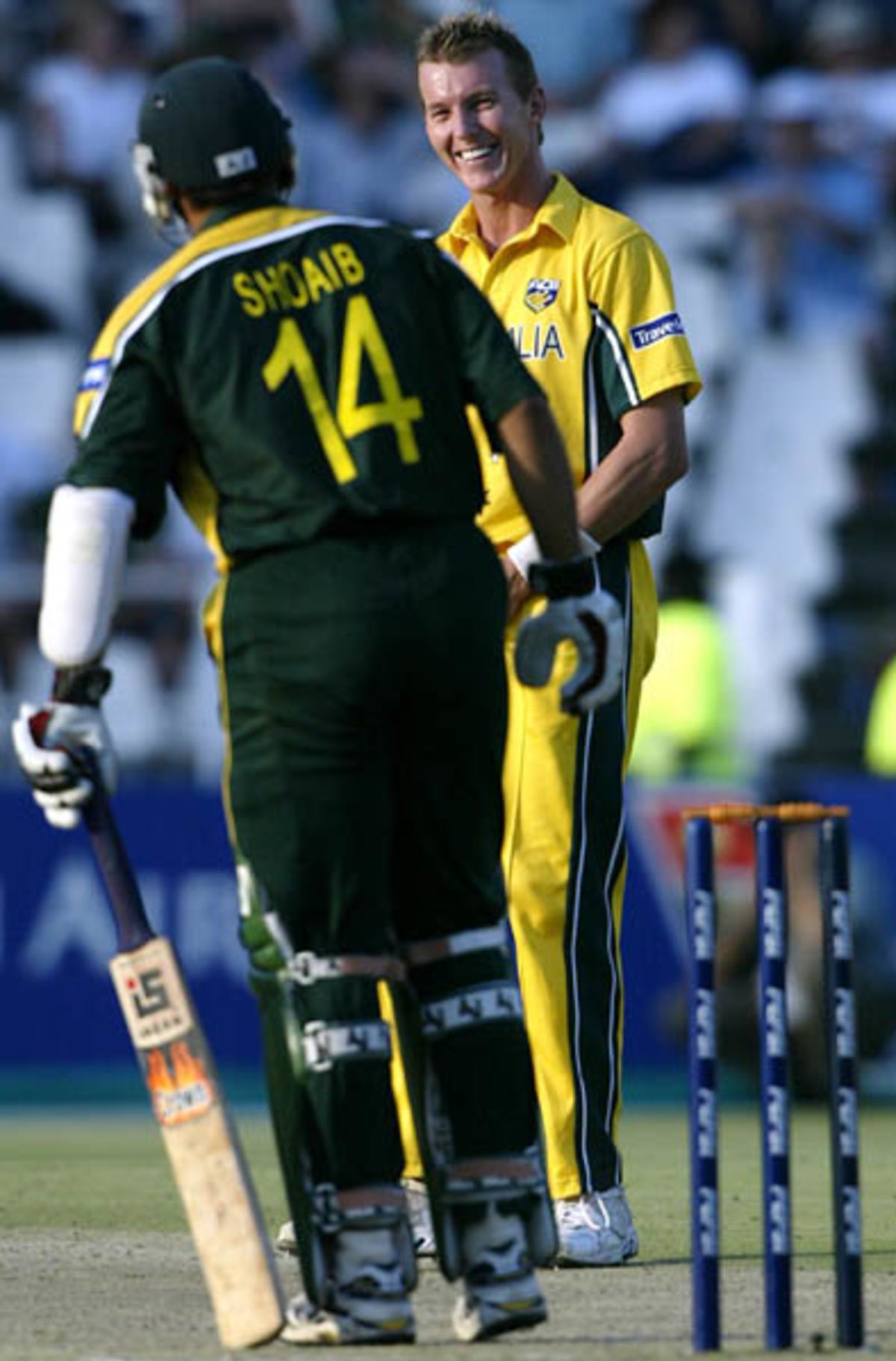Andrew Symonds is floored by a Waqar Younis delivery that narrowly ...