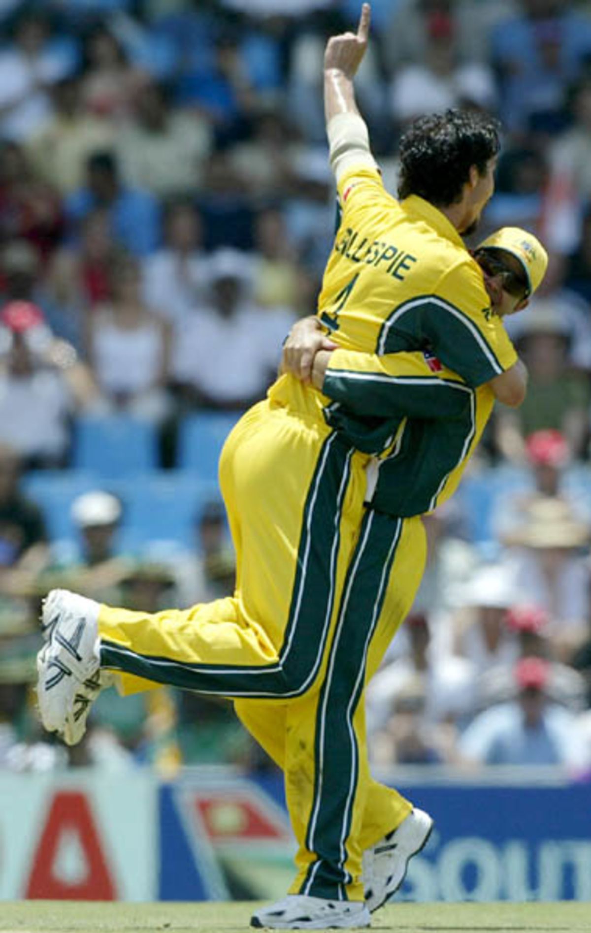 Sachin Tendulkar walks off the ground, as an Australian supporter waves ...