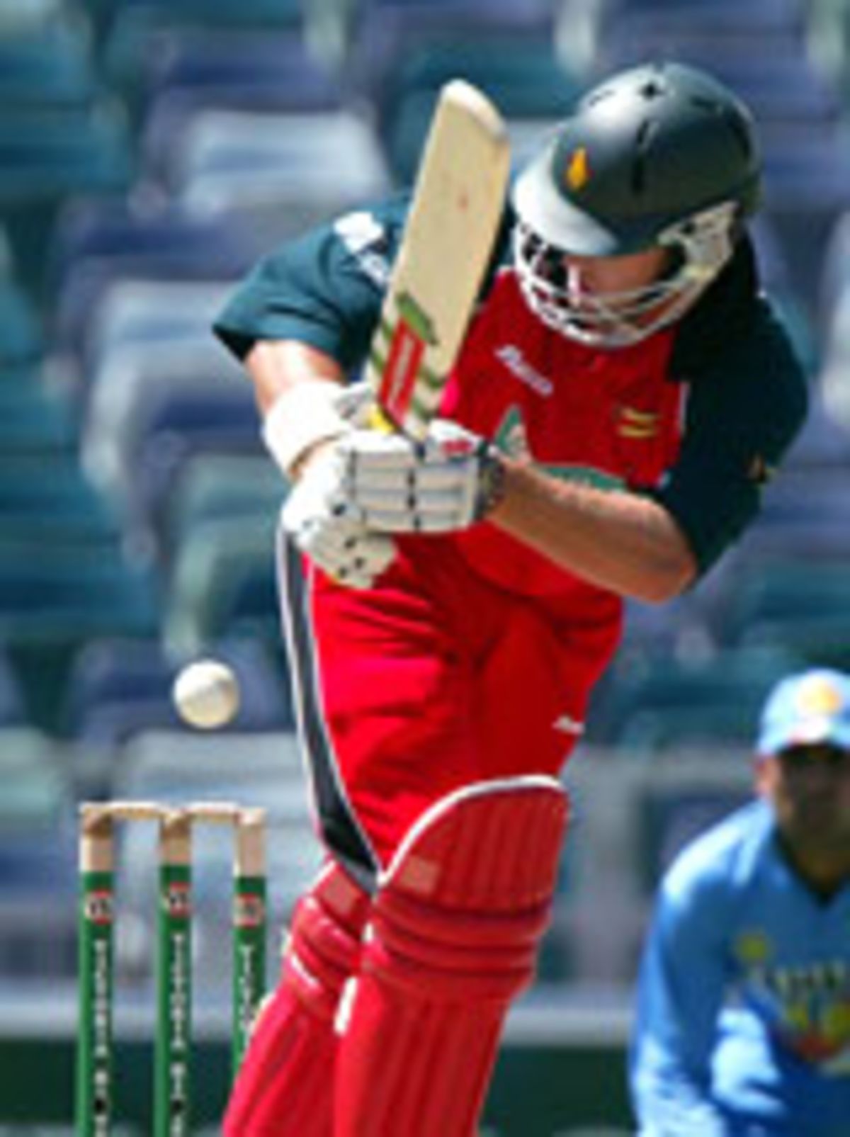 Ashish Nehra on the ground after slipping during his run-up | ESPNcricinfo.com