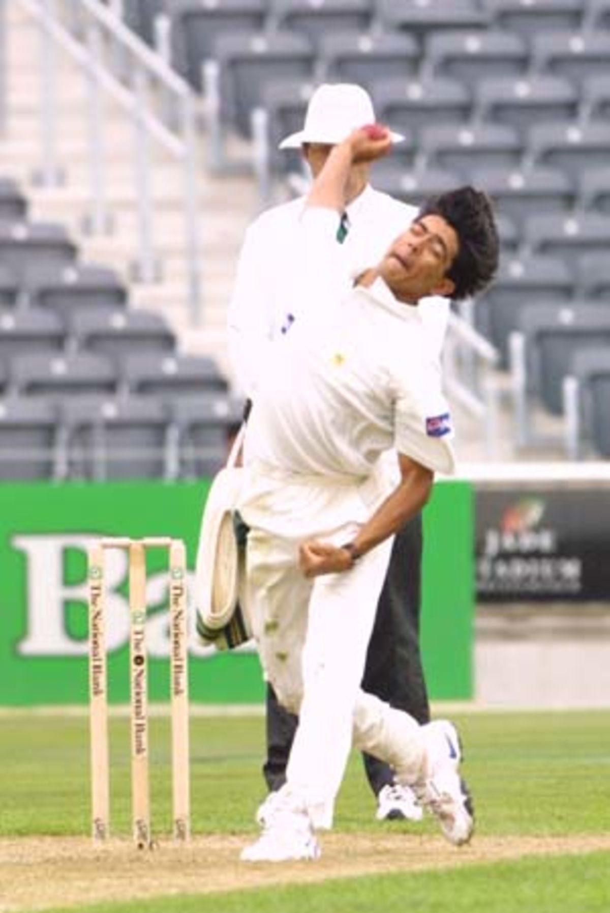 Sami delivers a ball during his first day spell of 0-85 | ESPNcricinfo.com