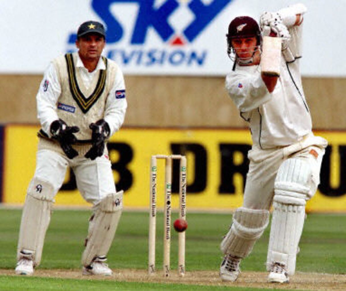 Umpire Dave Quested is given a leg-up | ESPNcricinfo.com