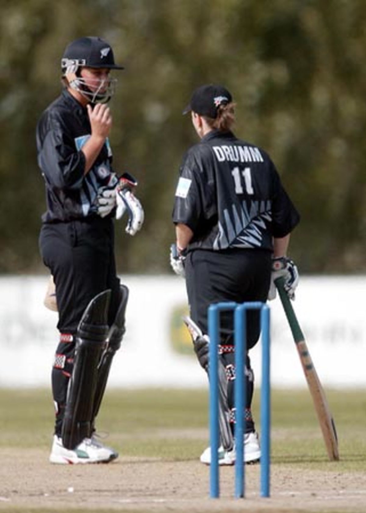 Rolls is congratulated by Drumm upon reaching her century. 3rd WODI ...