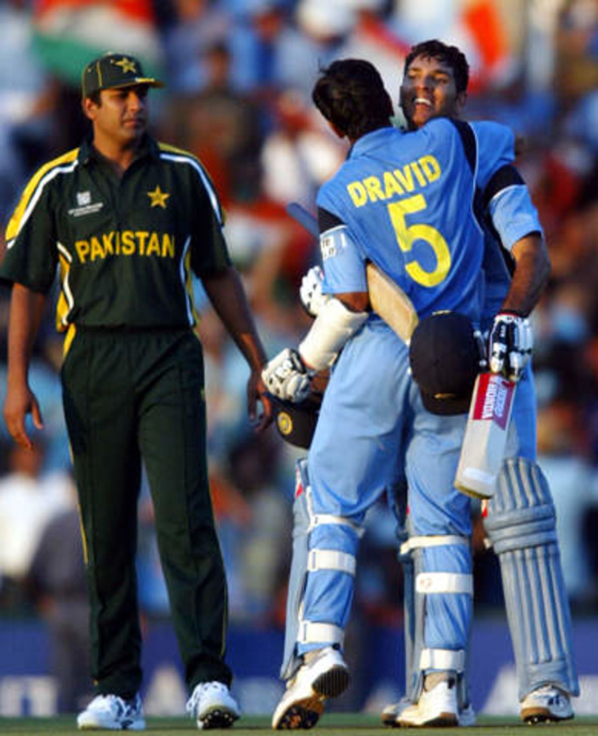 Rahul Dravid and Yuvraj Singh embrace to celebrate their victory over ...