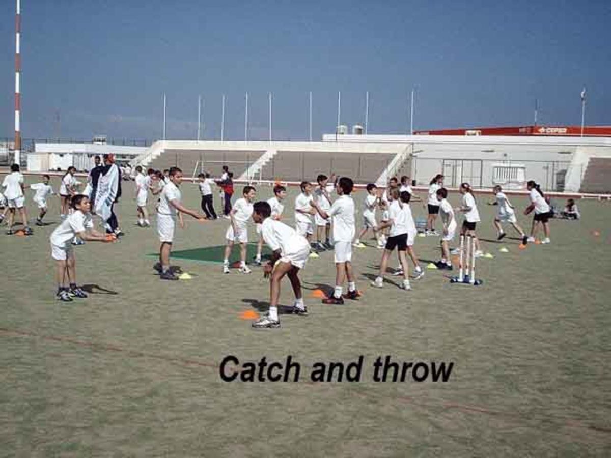 The students from Sacred Heart Middle School learning to catch and ...