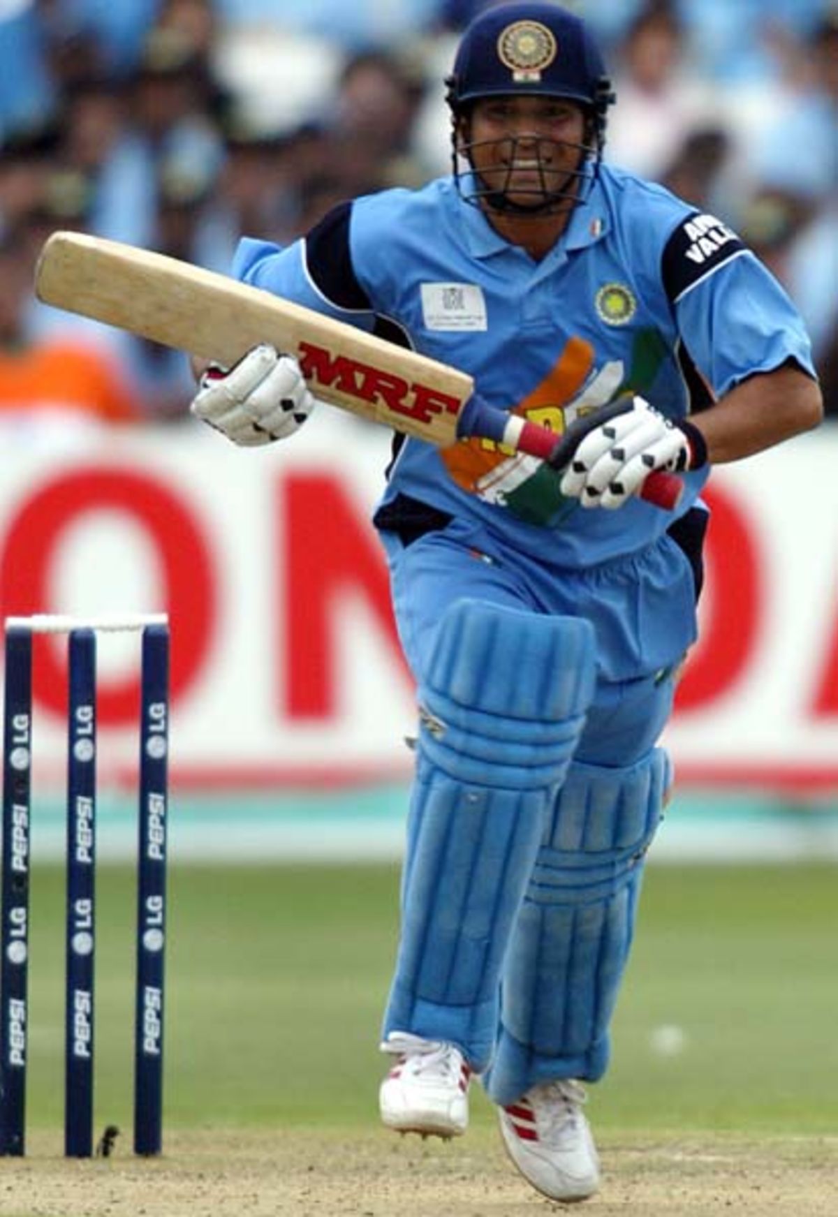 Tendulkar charges through for a quick run in the World Cup semi-final ...