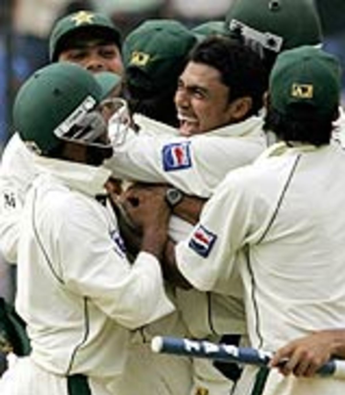 Danish Kaneria celebrates with his teammates | ESPNcricinfo.com Danish Kaneria celebrates with his teammates | ESPNcricinfo.com