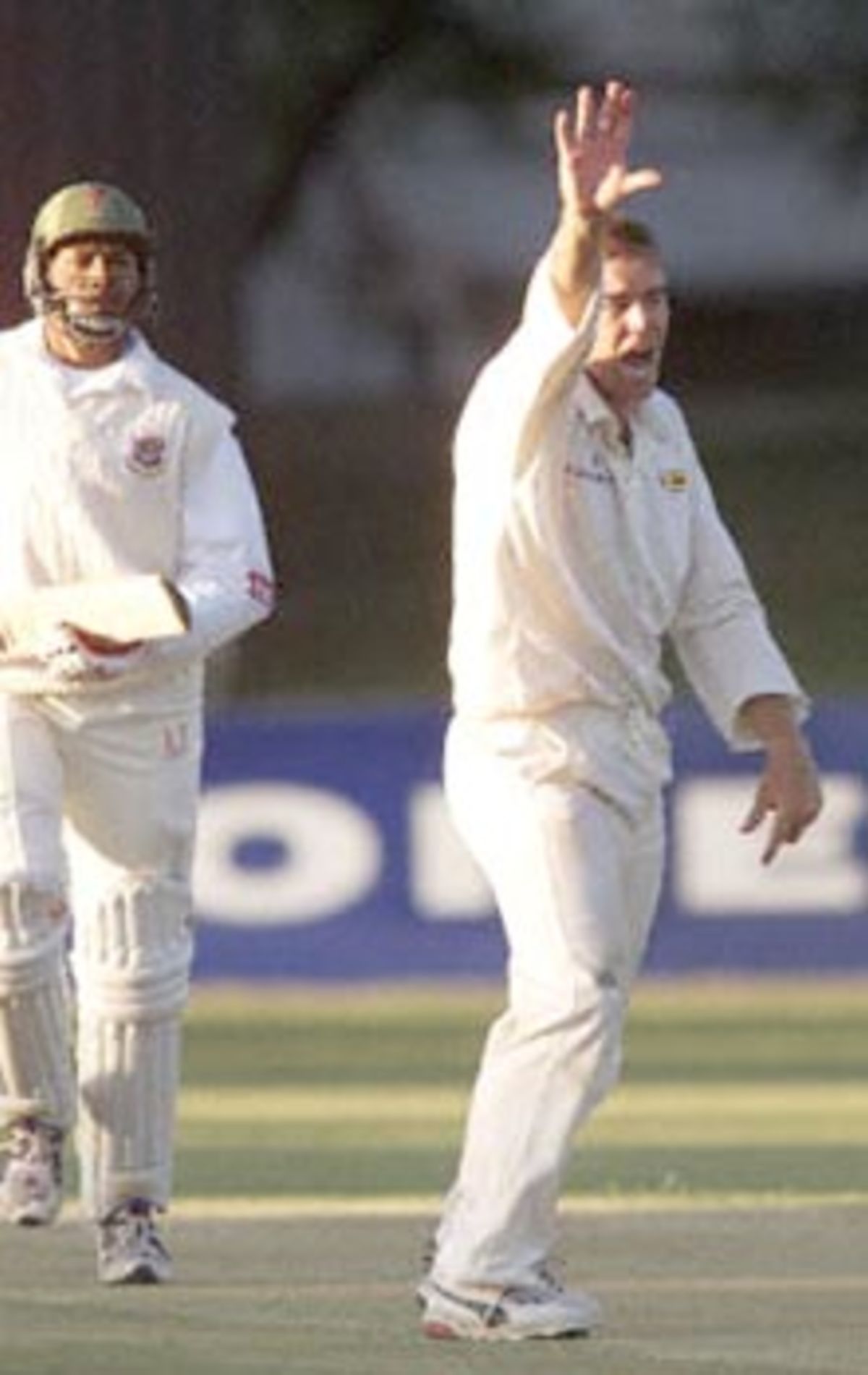 Andy Blignaut celebrates the scalp of tailender Mushfiqur Rehman ...