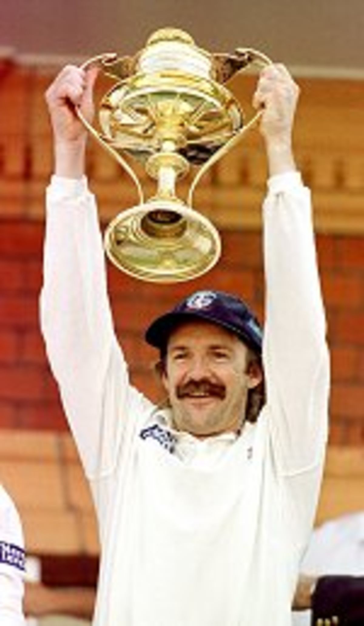 Jack Russell holding trophy | ESPNcricinfo.com
