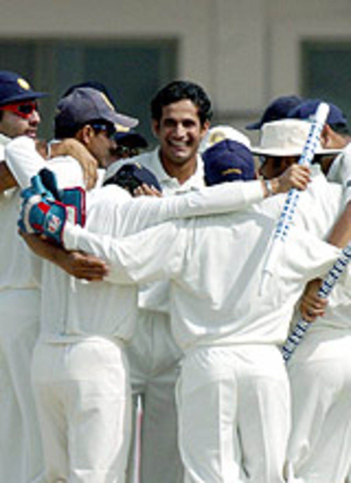 The Indian team huddle after the fall of the last wicket | ESPNcricinfo.com