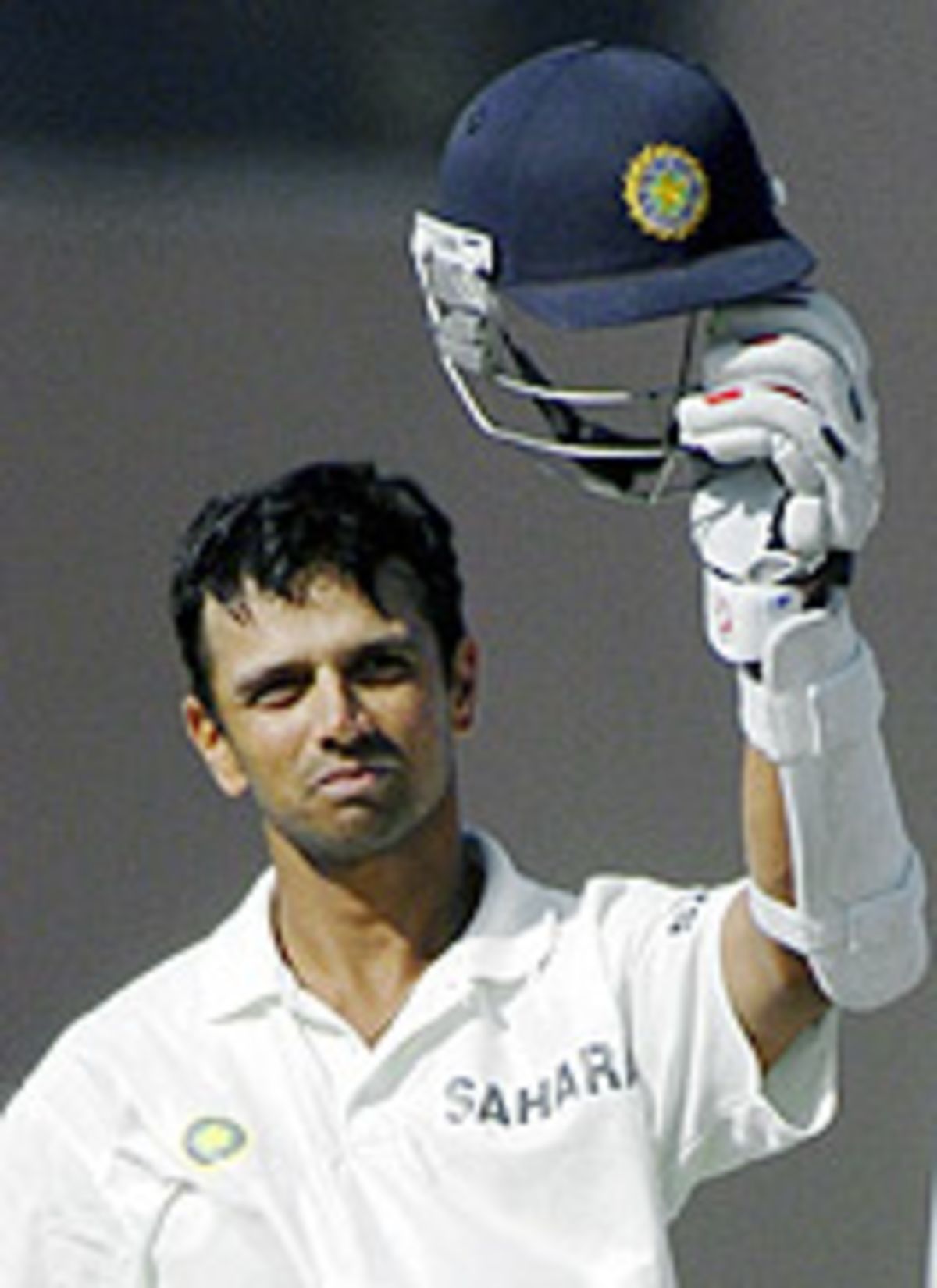 Rahul Dravid raises his helmet on reaching 100 | ESPNcricinfo.com