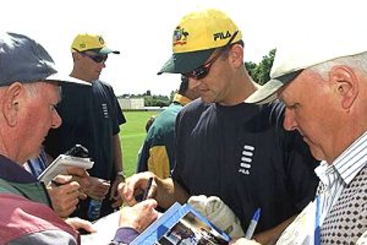 Adam Gilchrist signs autographs during an Ashes tour match at Worcester ...