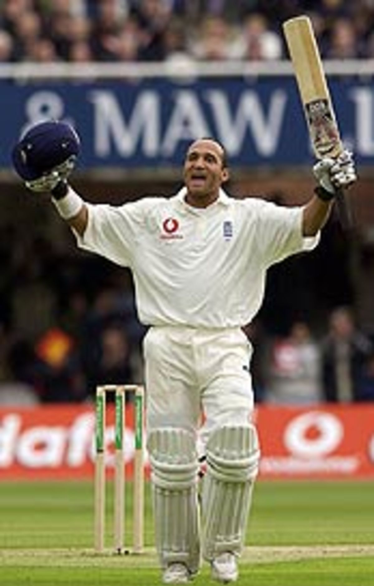 Mark Butcher celebrates his hundred during the second day of the first ...