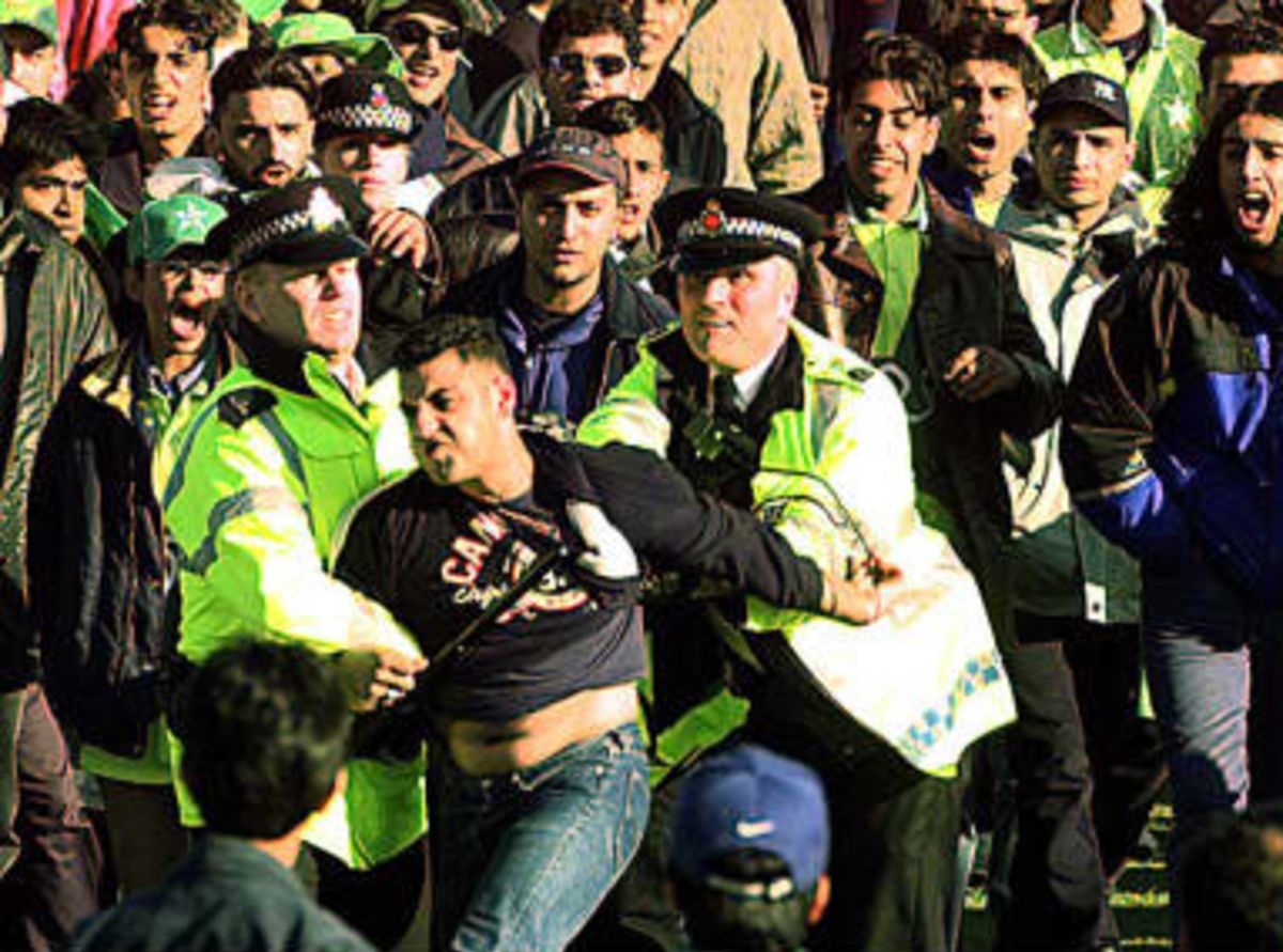 A Pakistani fan being arrested, 08 June 1999 | ESPNcricinfo.com