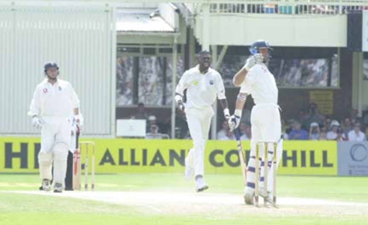 Walsh celebrates the wicket of Hussain | ESPNcricinfo.com