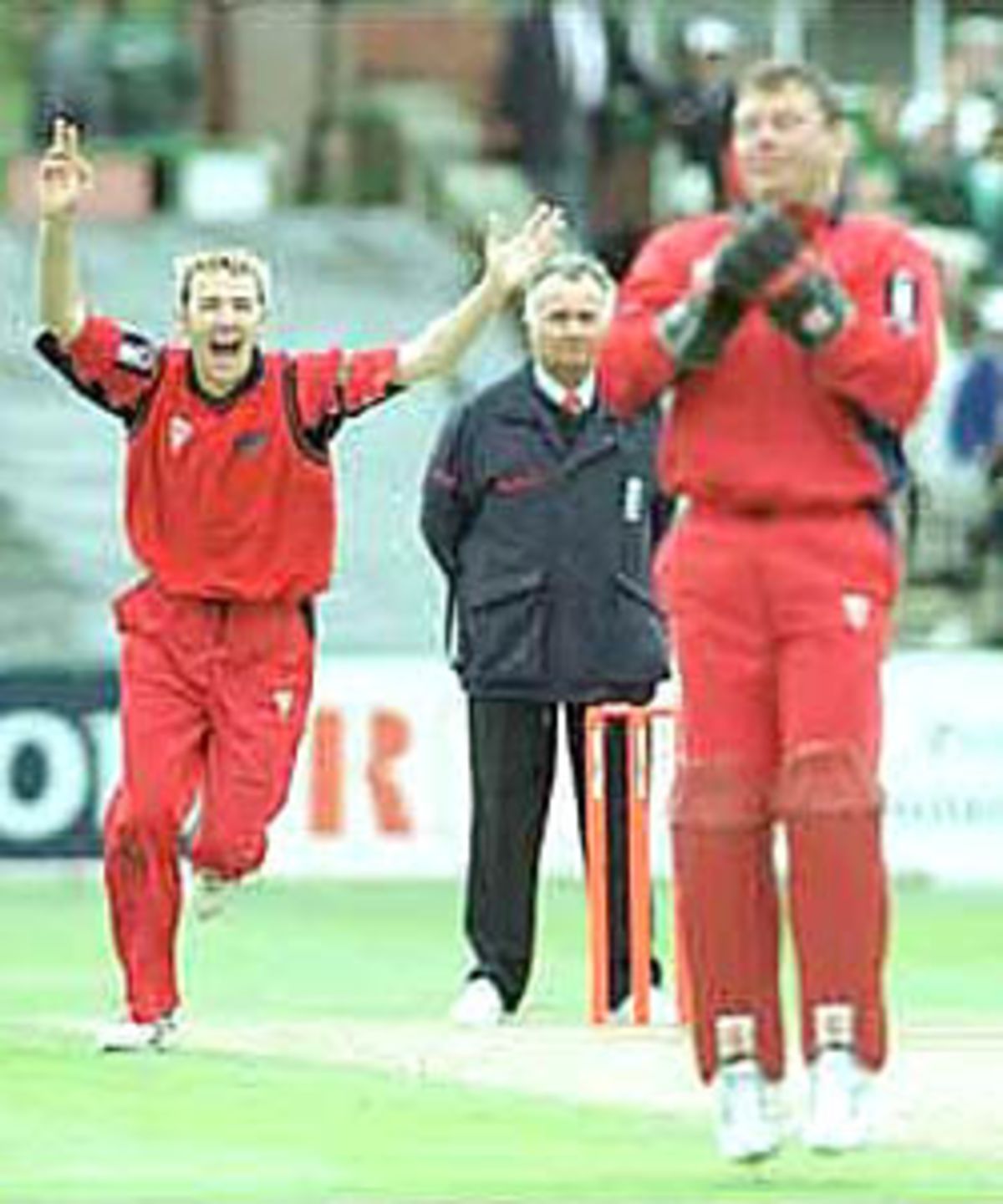 Chris Schofield celebrates as Warren Hegg catches out Graeme Hick ...
