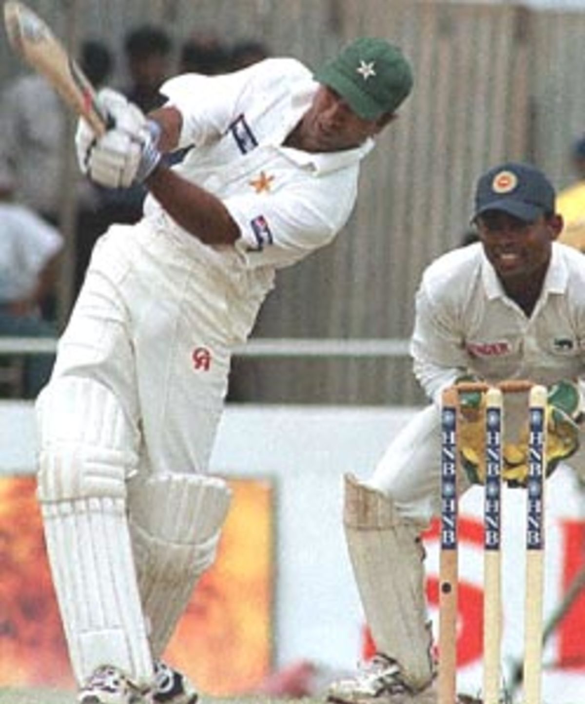 Saeed Anwar steps out to drive the ball forcefully | ESPNcricinfo.com