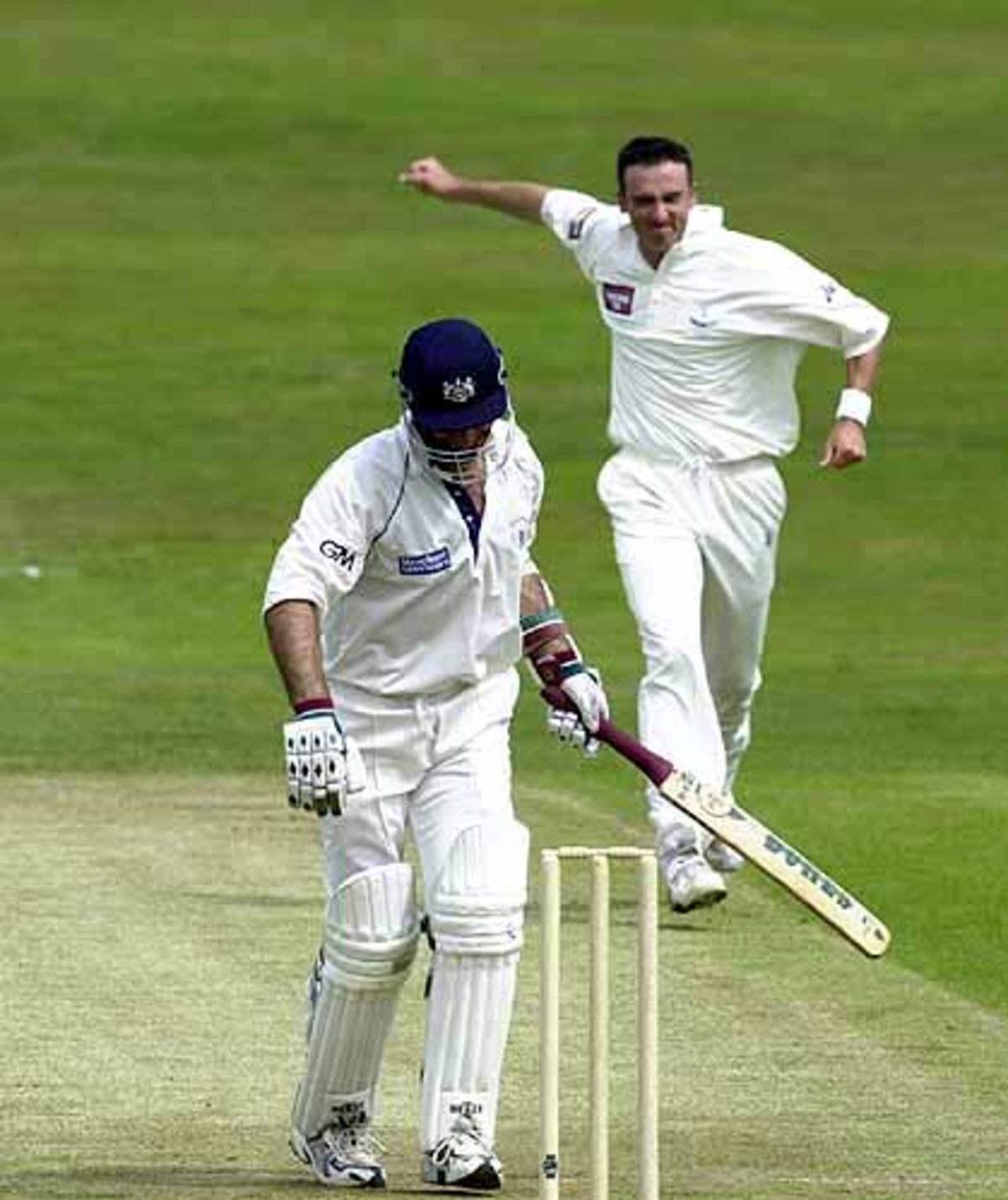 Gavin Hamilton has just had Kim Barnett caught behind for 31 ...