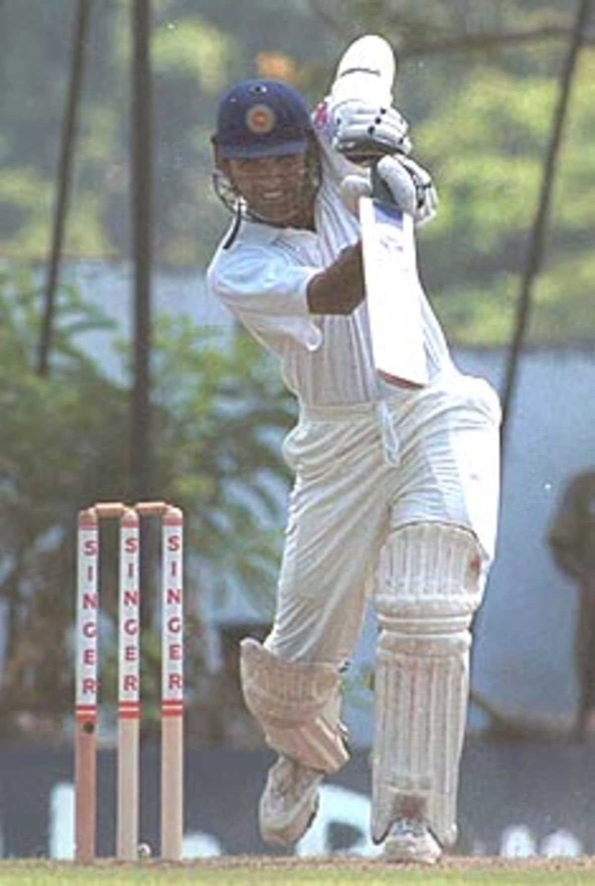 Marvan Atapattu playes a masterly straight drive on the way to an ...