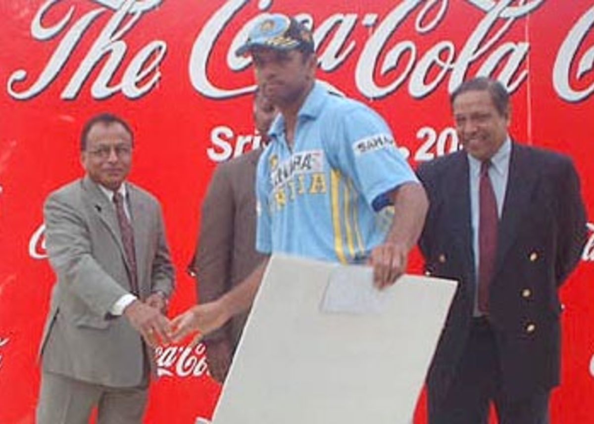 VVS Laxman, the hero of the day, receives his cheque for the Man of the ...