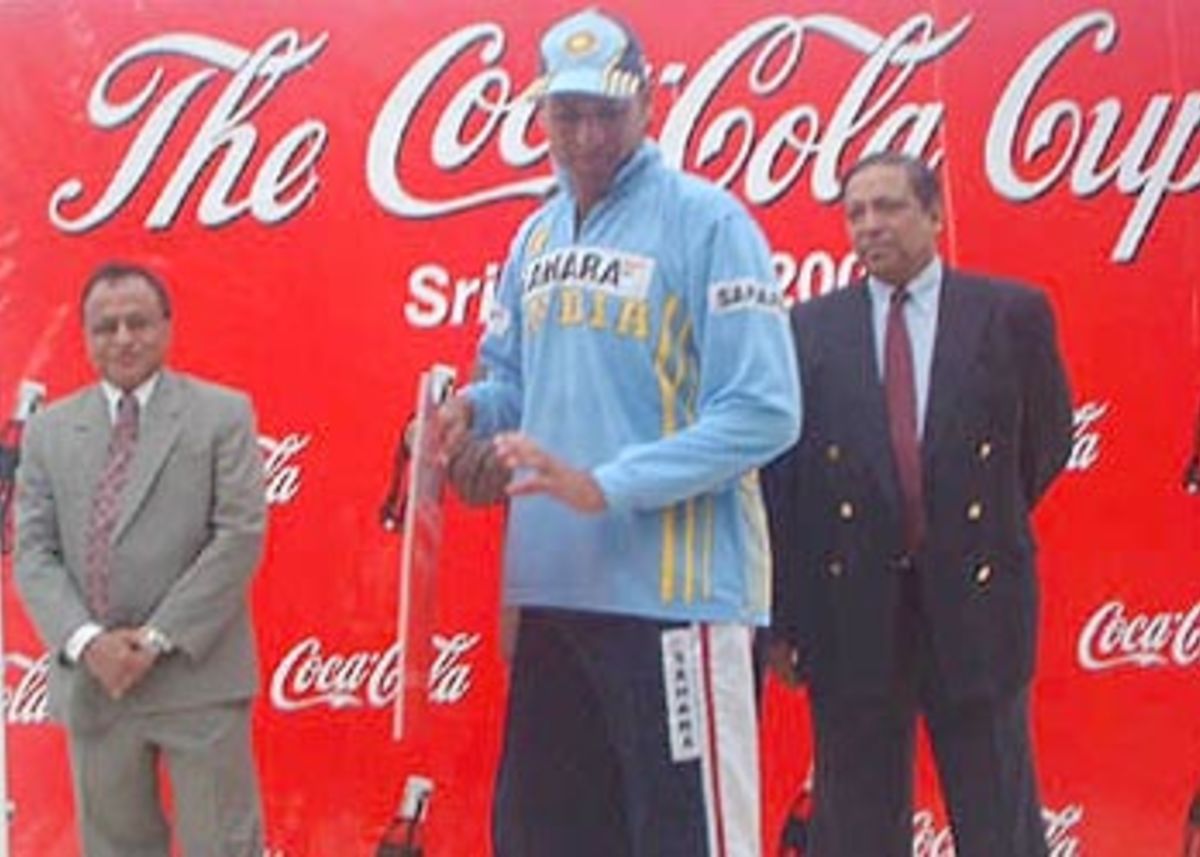 VVS Laxman, the hero of the day, receives his cheque for the Man of the ...