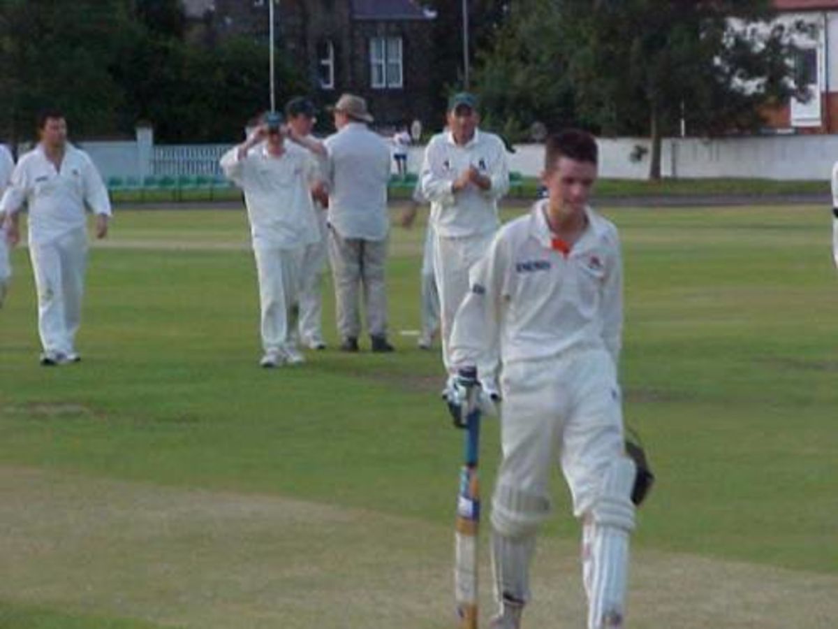 Rishton hero Scott Greaves leads the team off | ESPNcricinfo.com