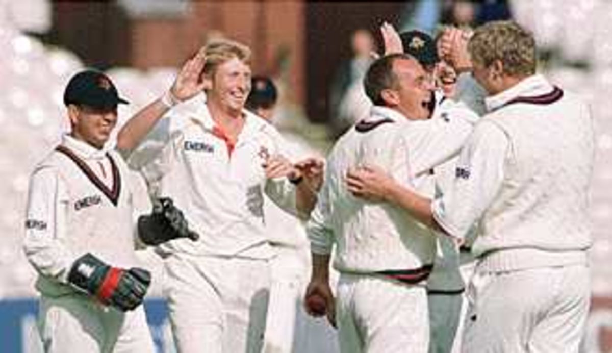 Graham Lloyd celebrating a catch with his team mates, Lancashire v ...