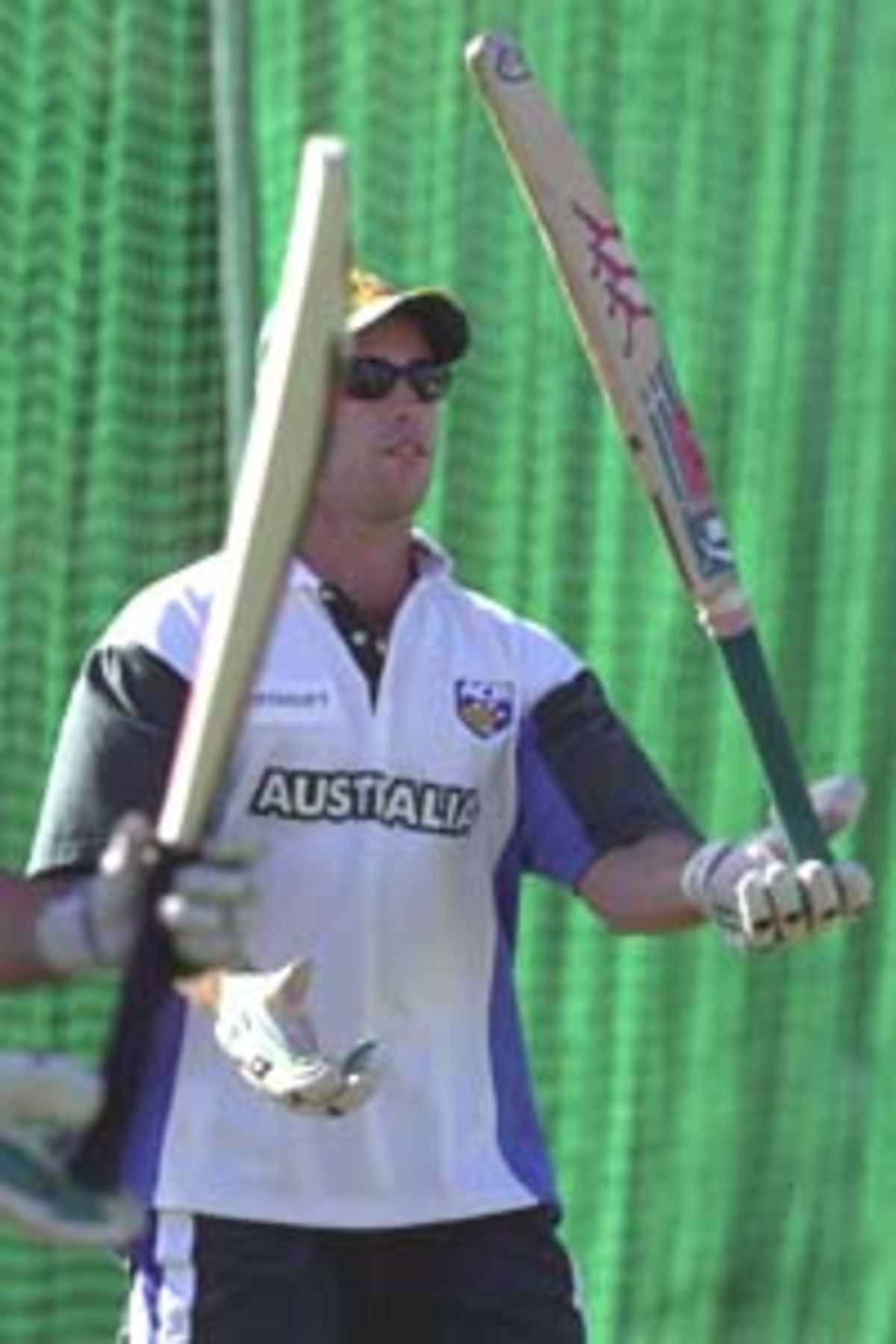 Bevan balancing a bat at training, August 2000 | ESPNcricinfo.com