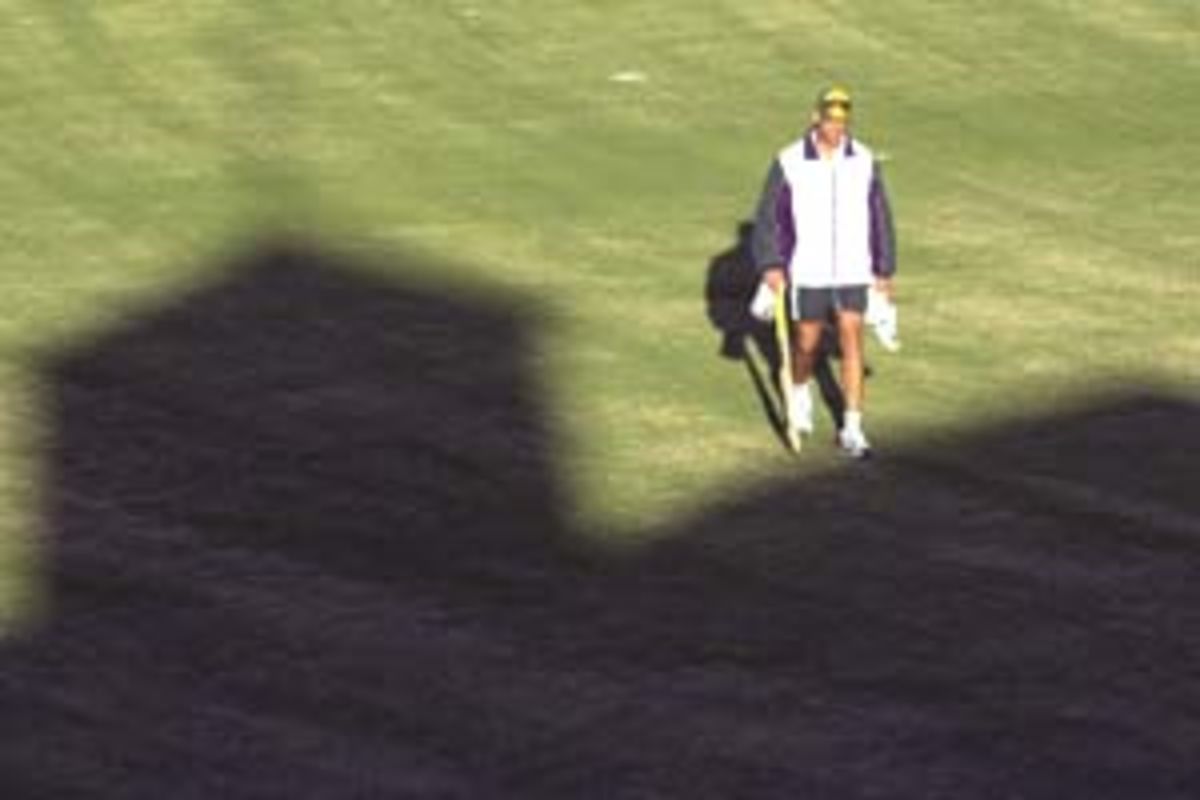 Symonds walks back to the pavilion after training, August 2000 ...
