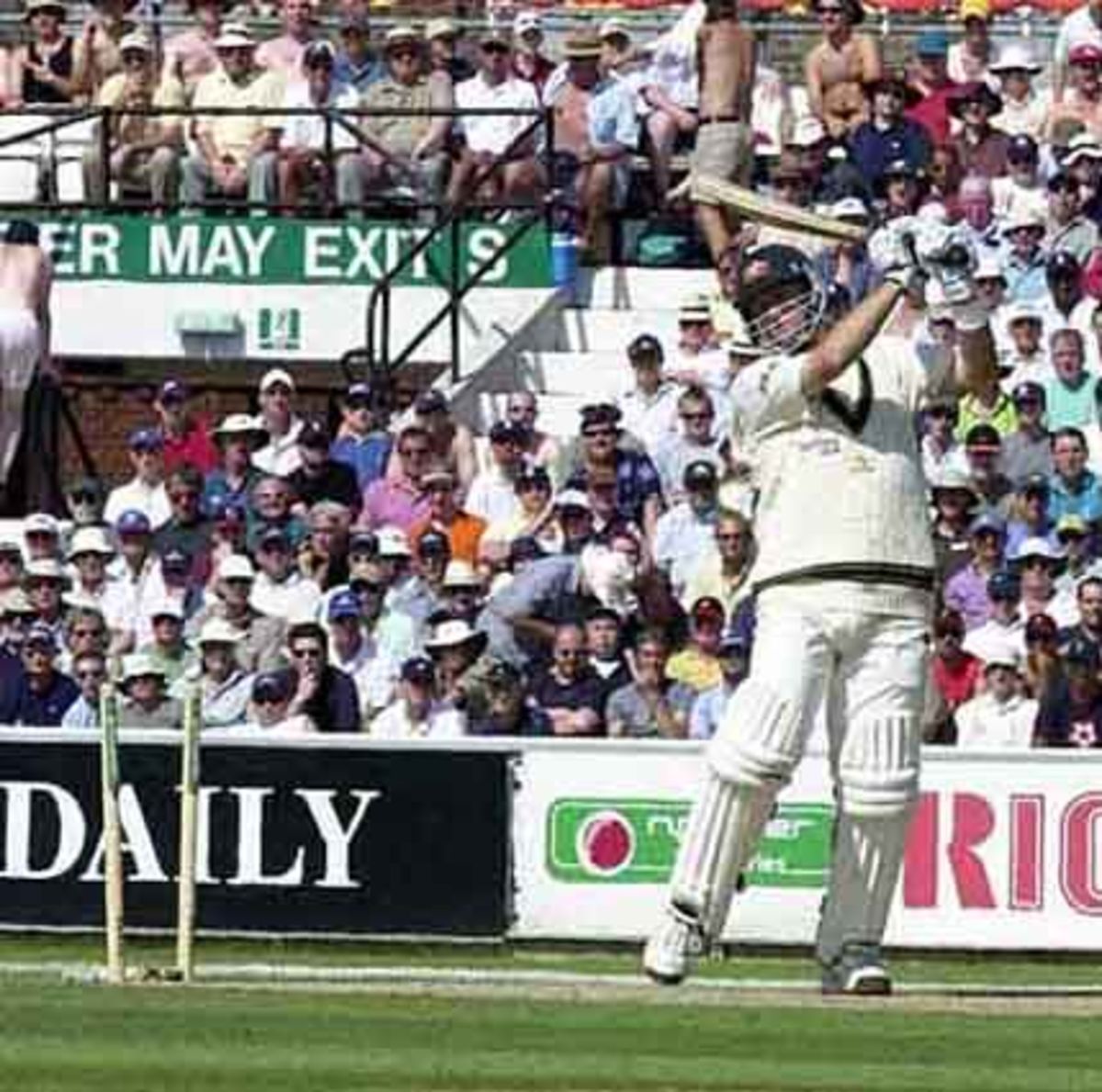 Gilchrist turns a ball round the corner in front of a flagging England ...