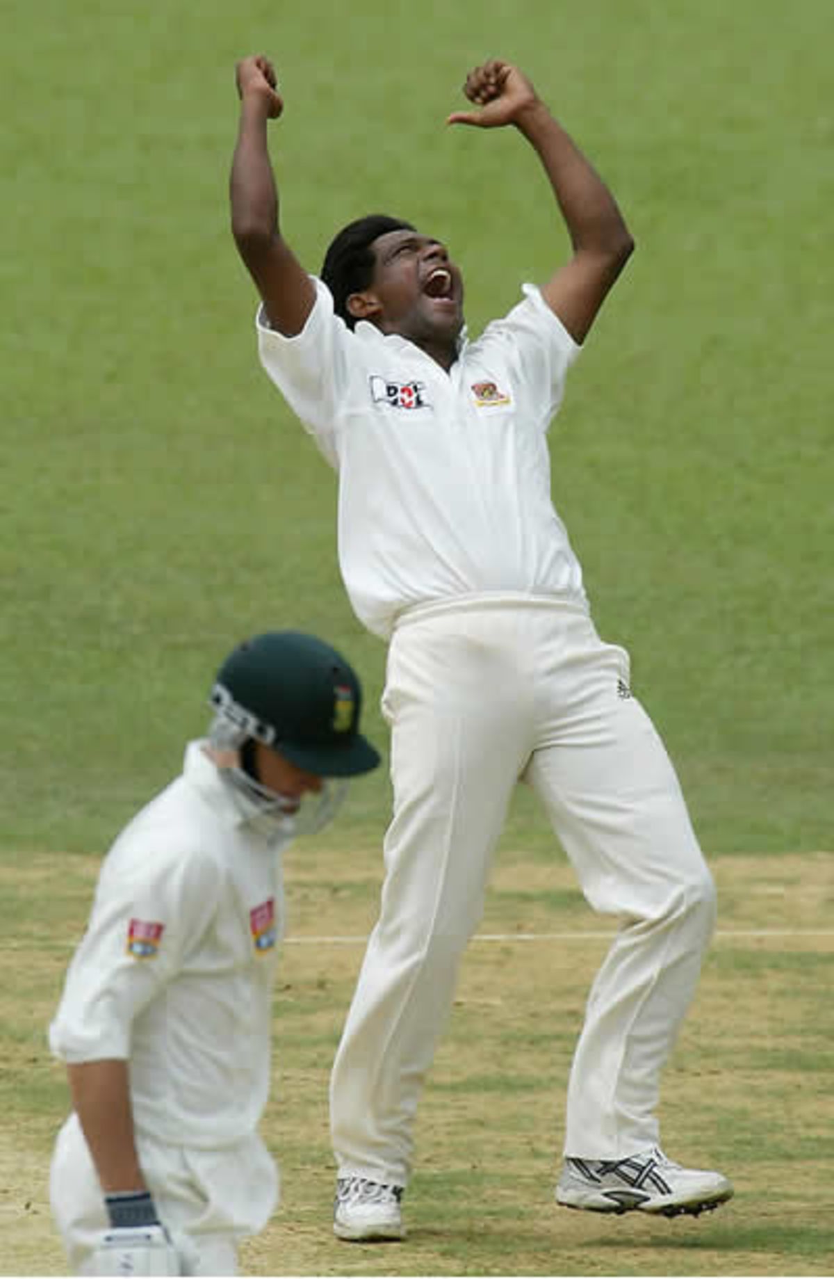 Mohammad Rafique of Bangladesh celebrates taking the wicket of Alan ...
