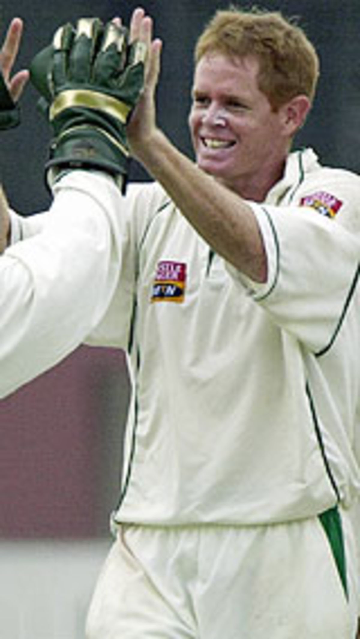 Shaun Pollock celebrates after the dismissal of Kumar Sangakkara ...