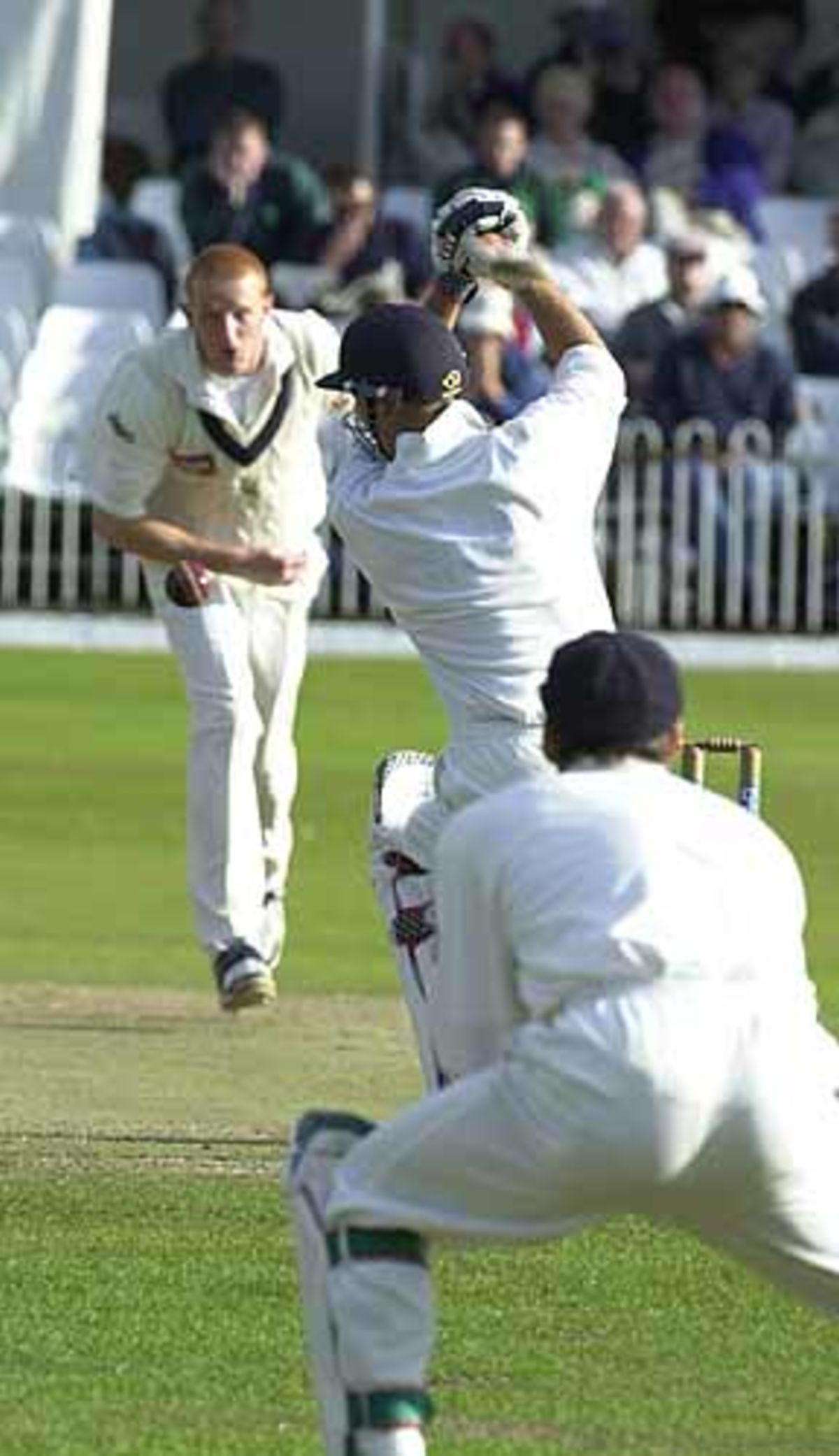 Richard Clinton takes a wild swing at a delivery from Kirby in the ...