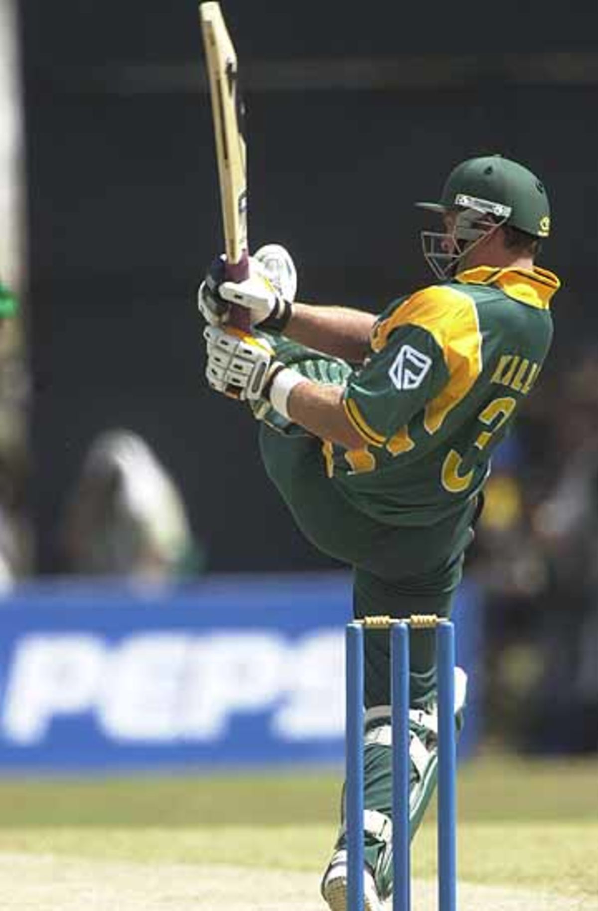 Jonty Rhodes plays a neat cut shot on his way to a half century ...