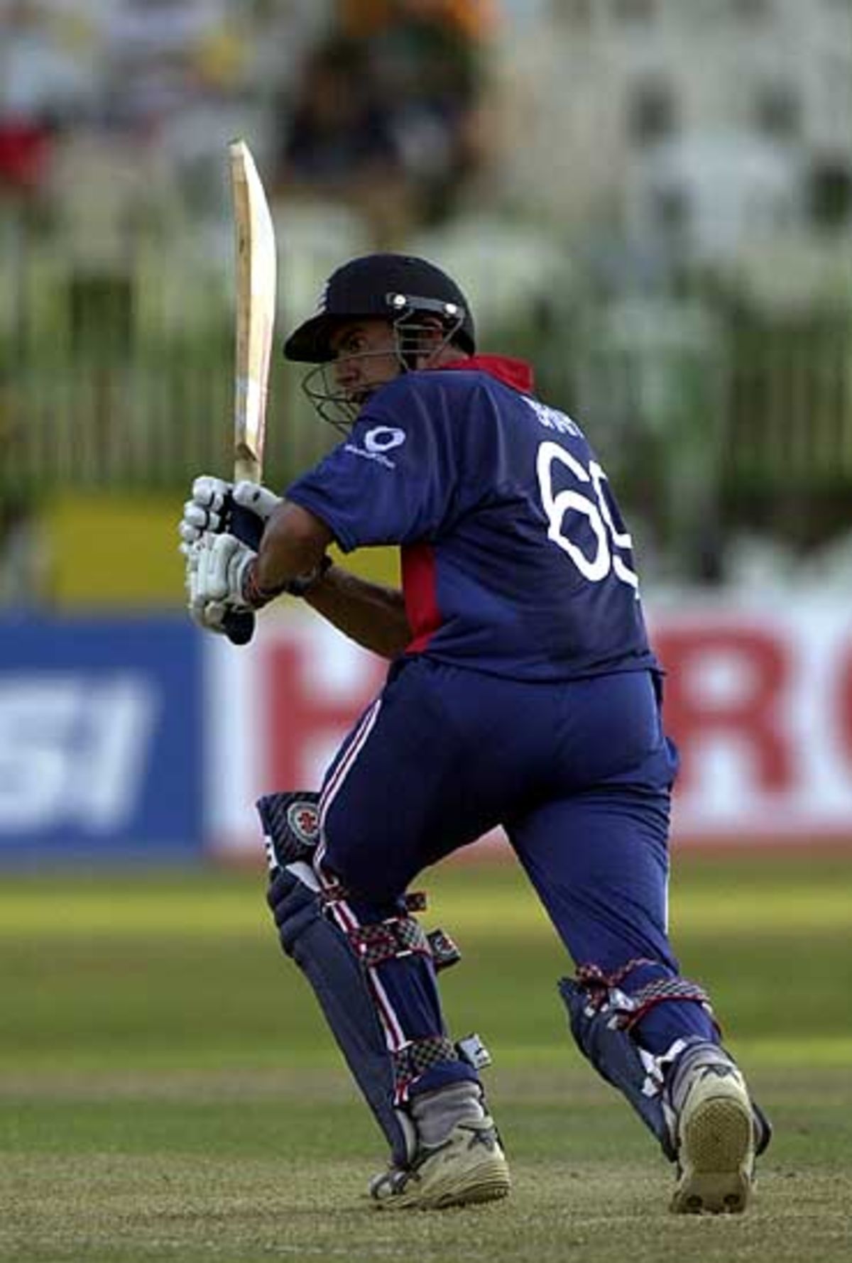 Ronnie Irani pops this delivery up to be caught at short square leg ...