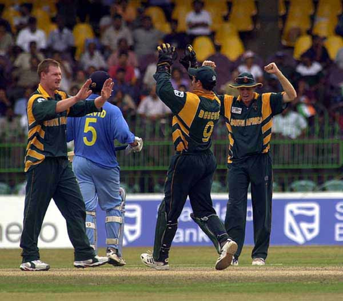 Rhodes gets down to field a Dravid cover drive | ESPNcricinfo.com