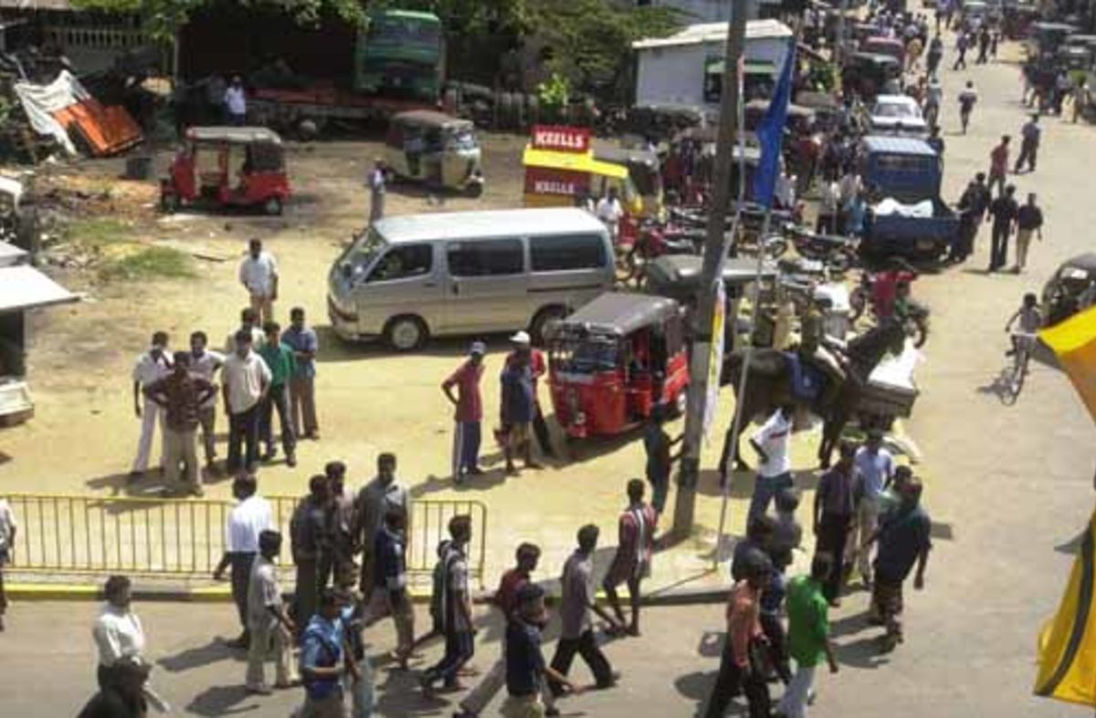 Road closures as some of the spectators come in through a side gate ...