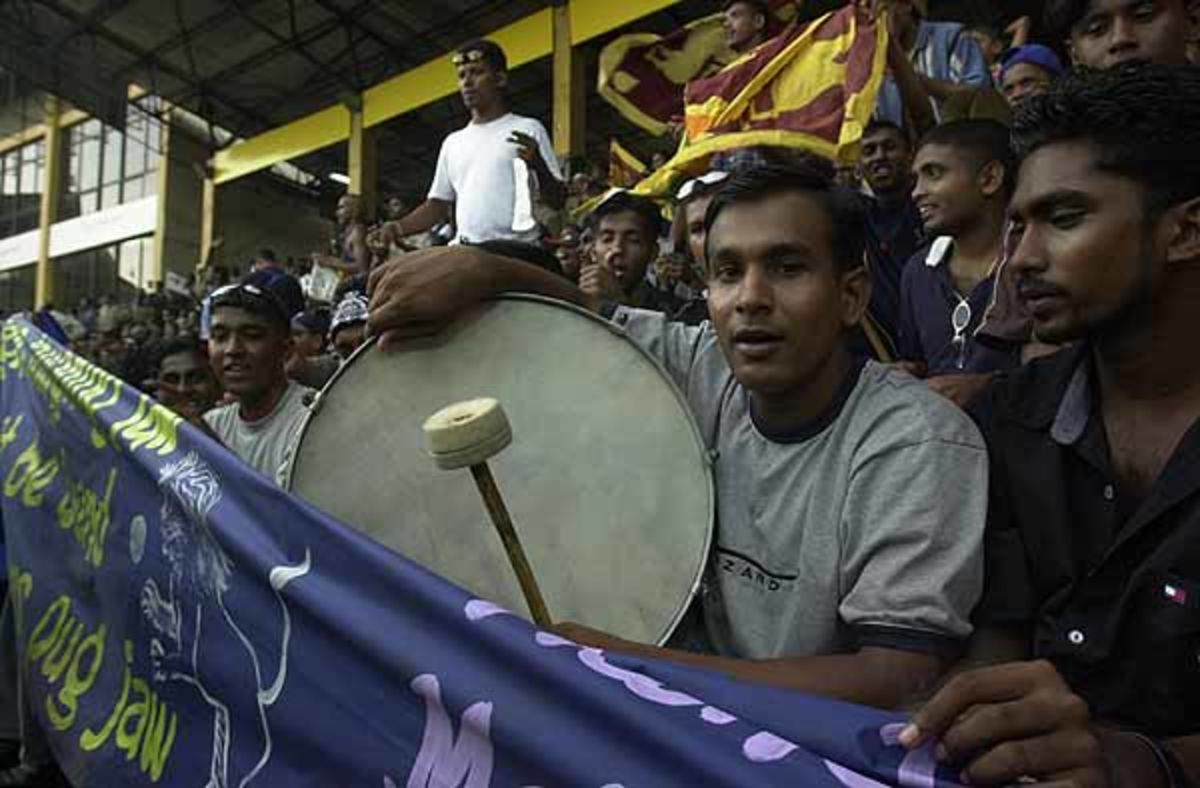 Young fans queue up by the turnstiles - nearly an all male activity ...