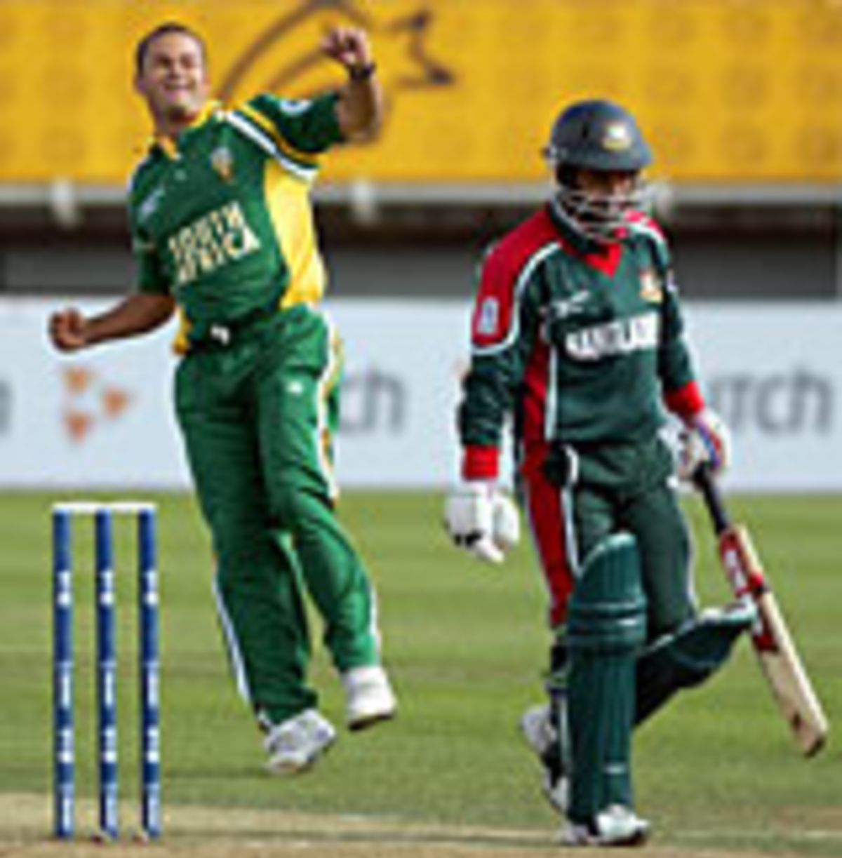 Charl Langeveldt celebrates one of his three early wickets ...