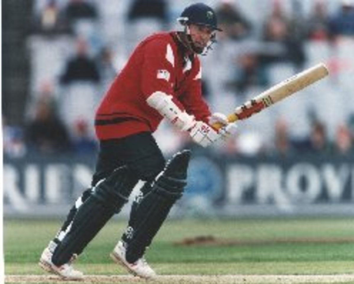 Hugh Morris sweeps the Middlesex spinners during the Championship match ...