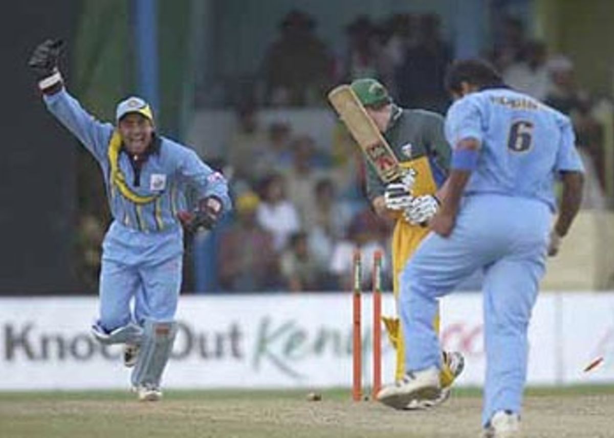 Robin Singh castles Damien Martyn and Dahiya runs up to congratulate ...