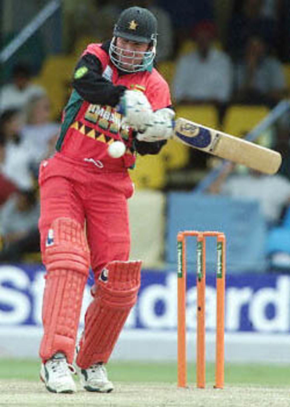 Roger Twose, Craig Spearman and Geoff Allott celebrate the fall of a ...